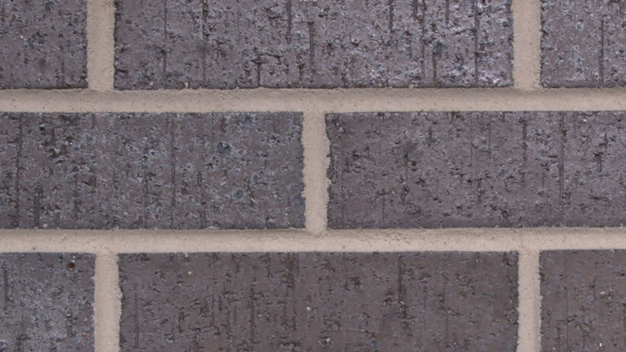 Dark Ironspot - Acme Brick